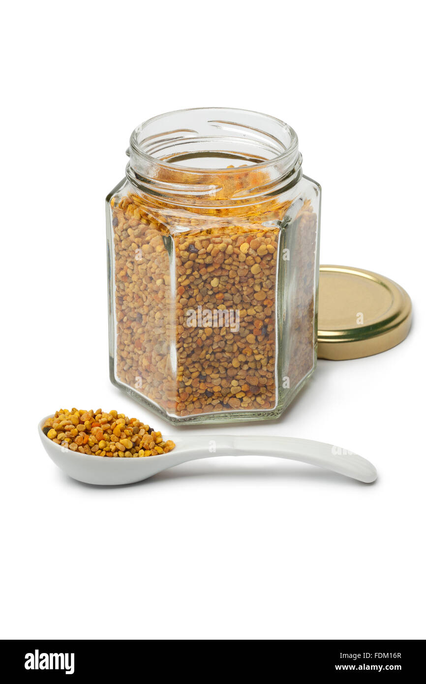 Bee pollen in a pot and on a spoon white background Stock Photo - Alamy