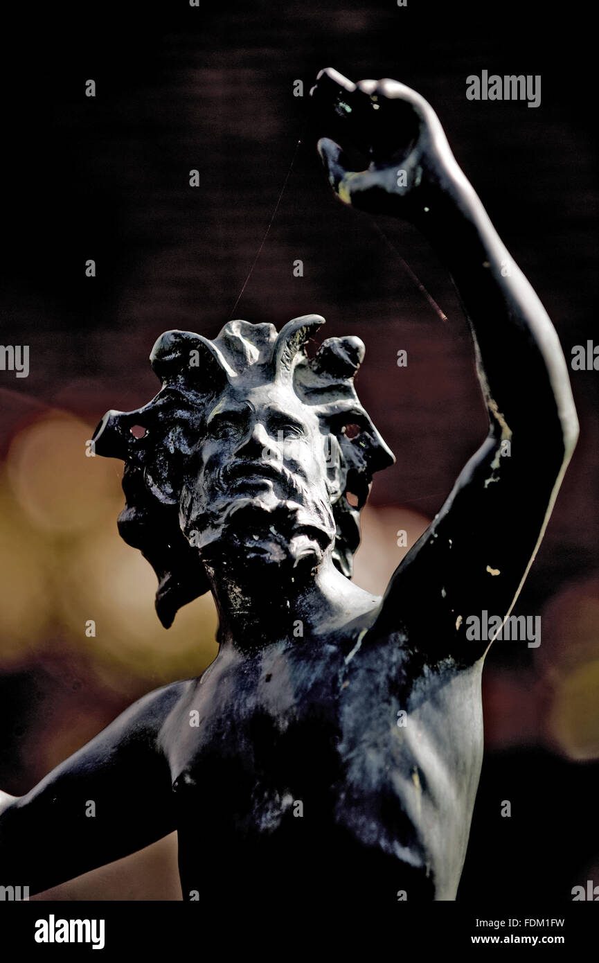 Head of the Dancing Faun statue in the White Garden at Barrington Court ...