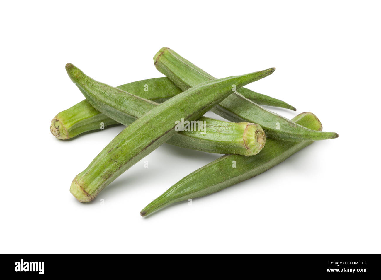 Fresh raw okra on white background Stock Photo - Alamy
