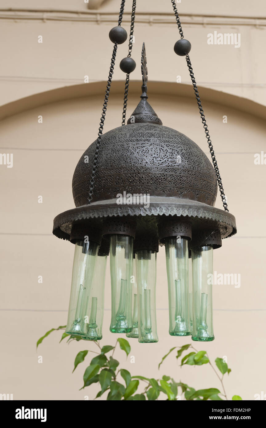 Pierced metal and glass Islamic mosque lamp in the Conservatory at ...