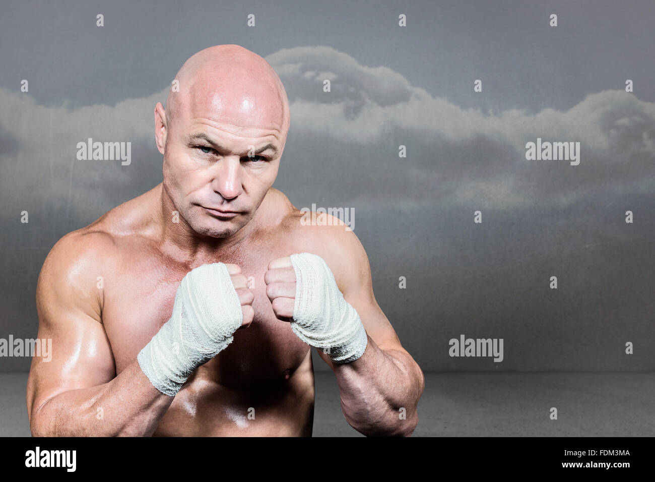 Composite image of portrait of confident man with fighting stance Stock ...