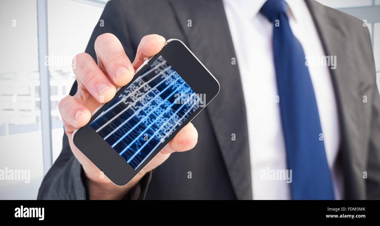 Composite image of businessman showing his smartphone screen Stock ...