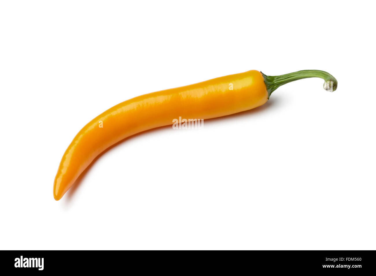 Single fresh orange chili pepper on white background Stock Photo - Alamy