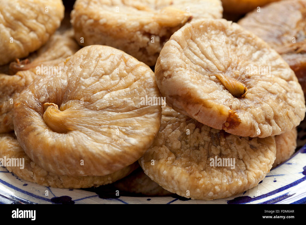 Dried figs on a traditional Moroccan dish close up Stock Photo - Alamy