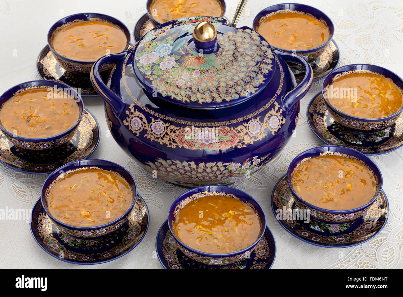 Traditional Moroccan harira soup in soup-tureen and bowls Stock Photo ...