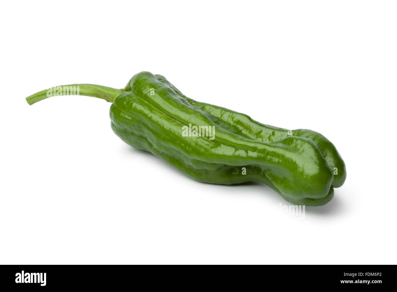 Single fresh whole green shisito pepper on white background Stock Photo ...