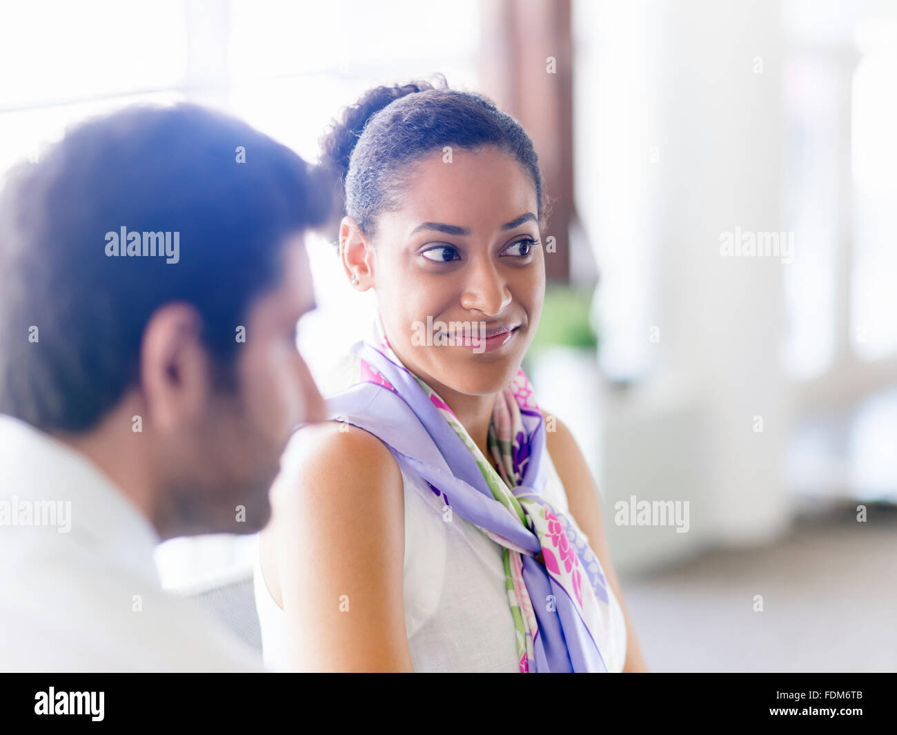 Collegues working together in an office Stock Photo - Alamy