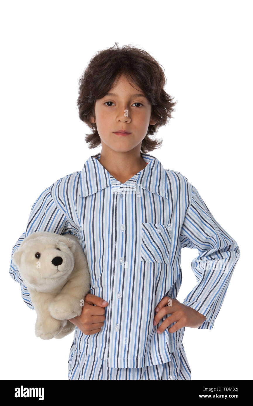 Little boy in pyjamas, ready for bed, on white background Stock Photo ...