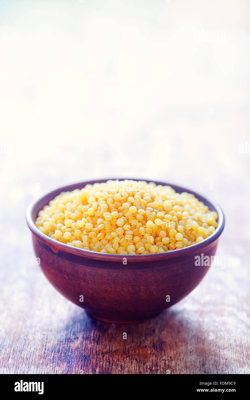 raw ptitim in bowl and on a table Stock Photo - Alamy