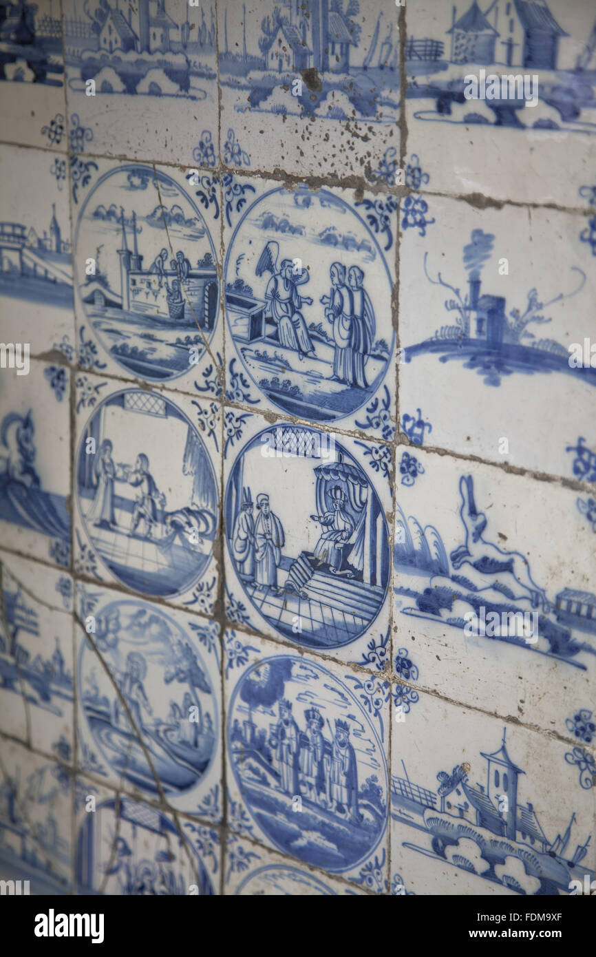 Delft tiles in the fireplace in the Great Parlour at Chastleton House ...