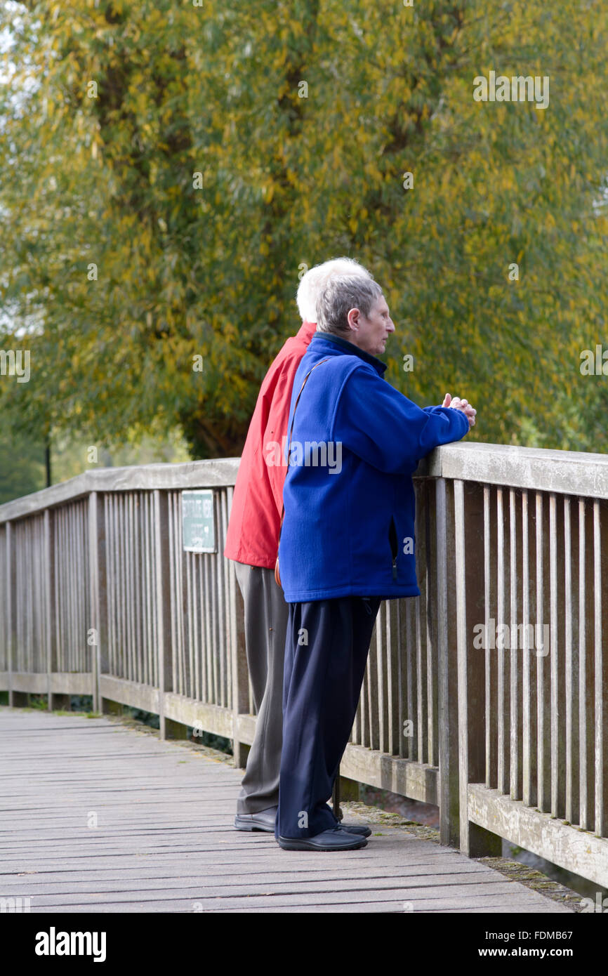 Leaning on railings hi-res stock photography and images - Alamy