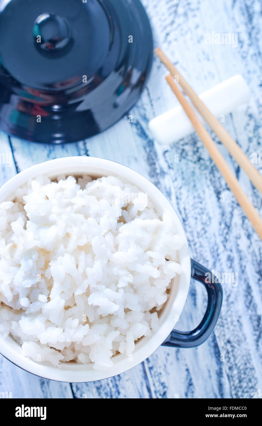 boiled rice in bowl and on a table Stock Photo - Alamy