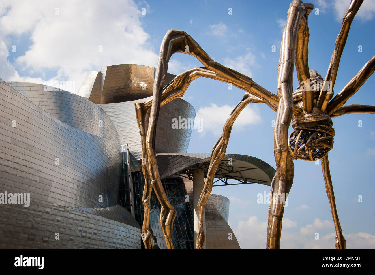 Guggenheim Bilbao museum with spider bronze sculpture Stock Photo - Alamy