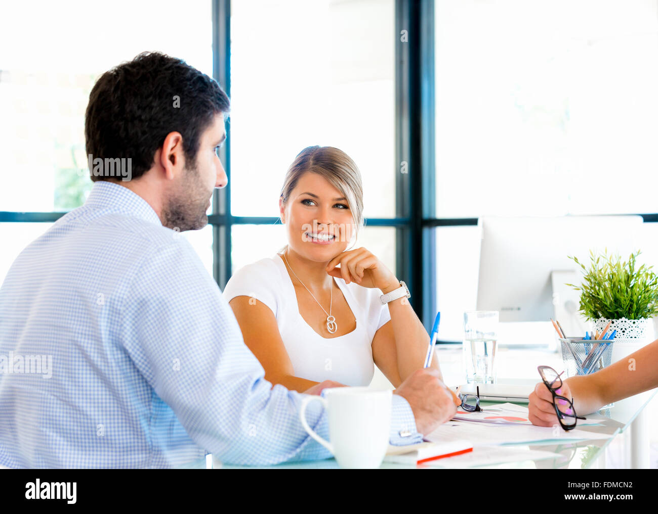 Business people having discussion in office Stock Photo - Alamy