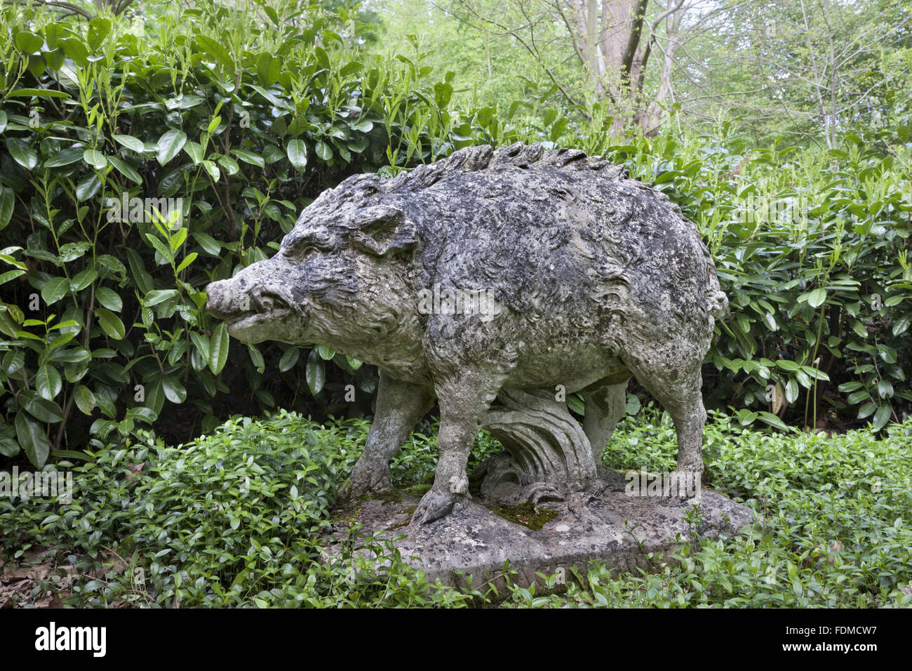 The stone Boar statue at Claremont Landscape Garden, Surrey Stock Photo ...