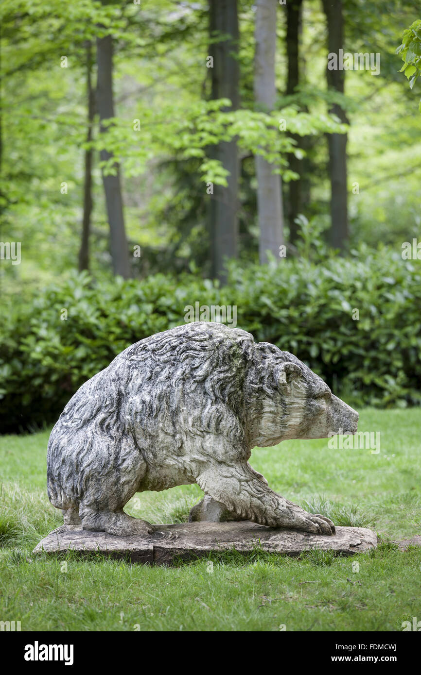 The stone Bear statue at Claremont Landscape Garden, Surrey Stock Photo ...
