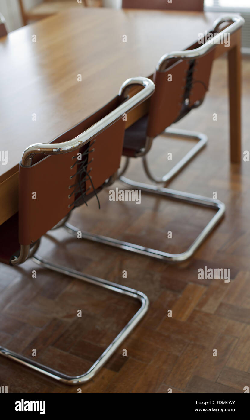 Dining table and chairs at High Cross House, Dartington, Devon. High ...