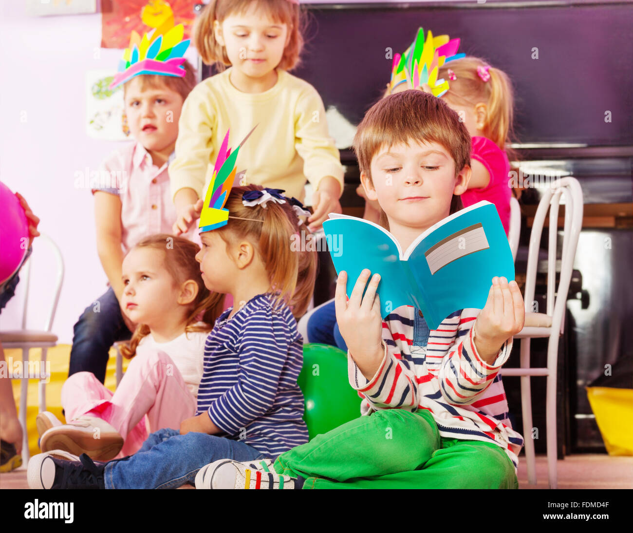 Happy children in class room hi-res stock photography and images - Alamy