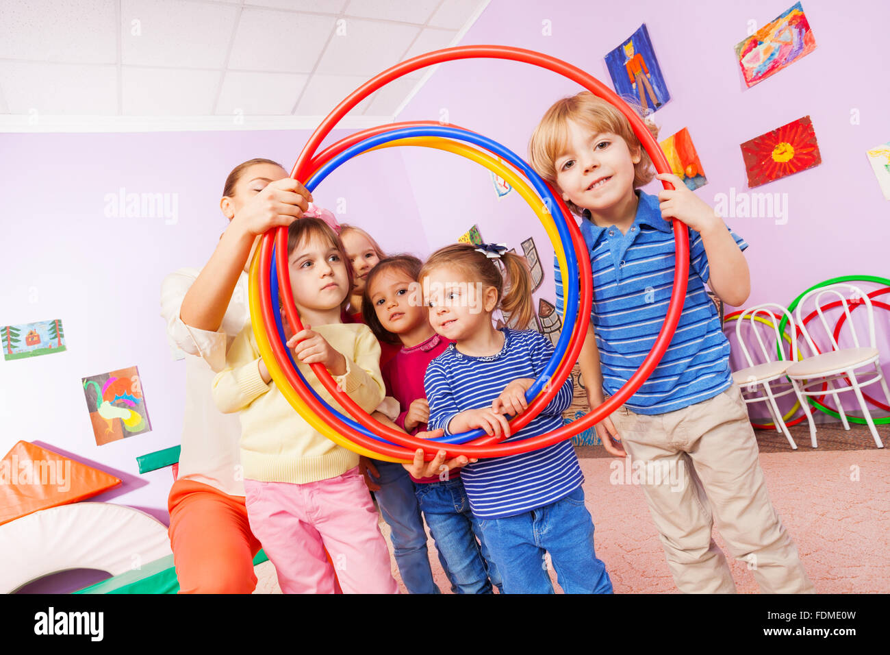Girls boys hula hoop hi-res stock photography and images - Alamy