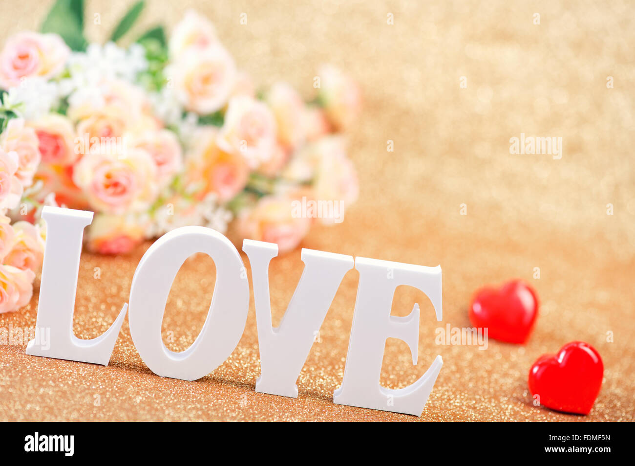 Valentine's day concept with gift box and letters "love Stock Photo - Alamy