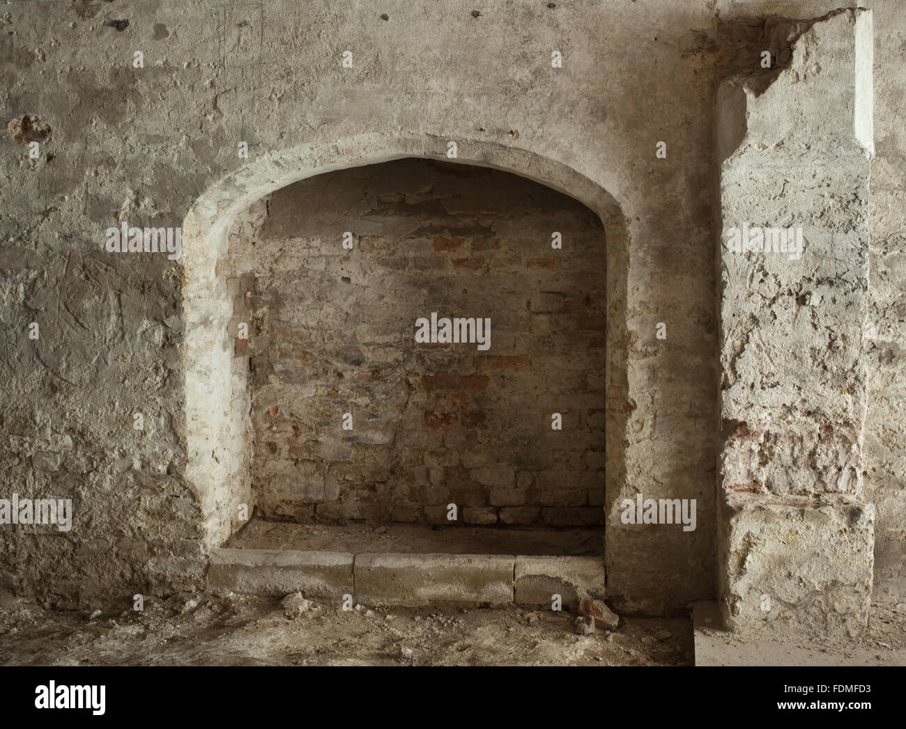 Fireplace niche in the cellar at Melford Hall, Suffolk. The cellars are ...