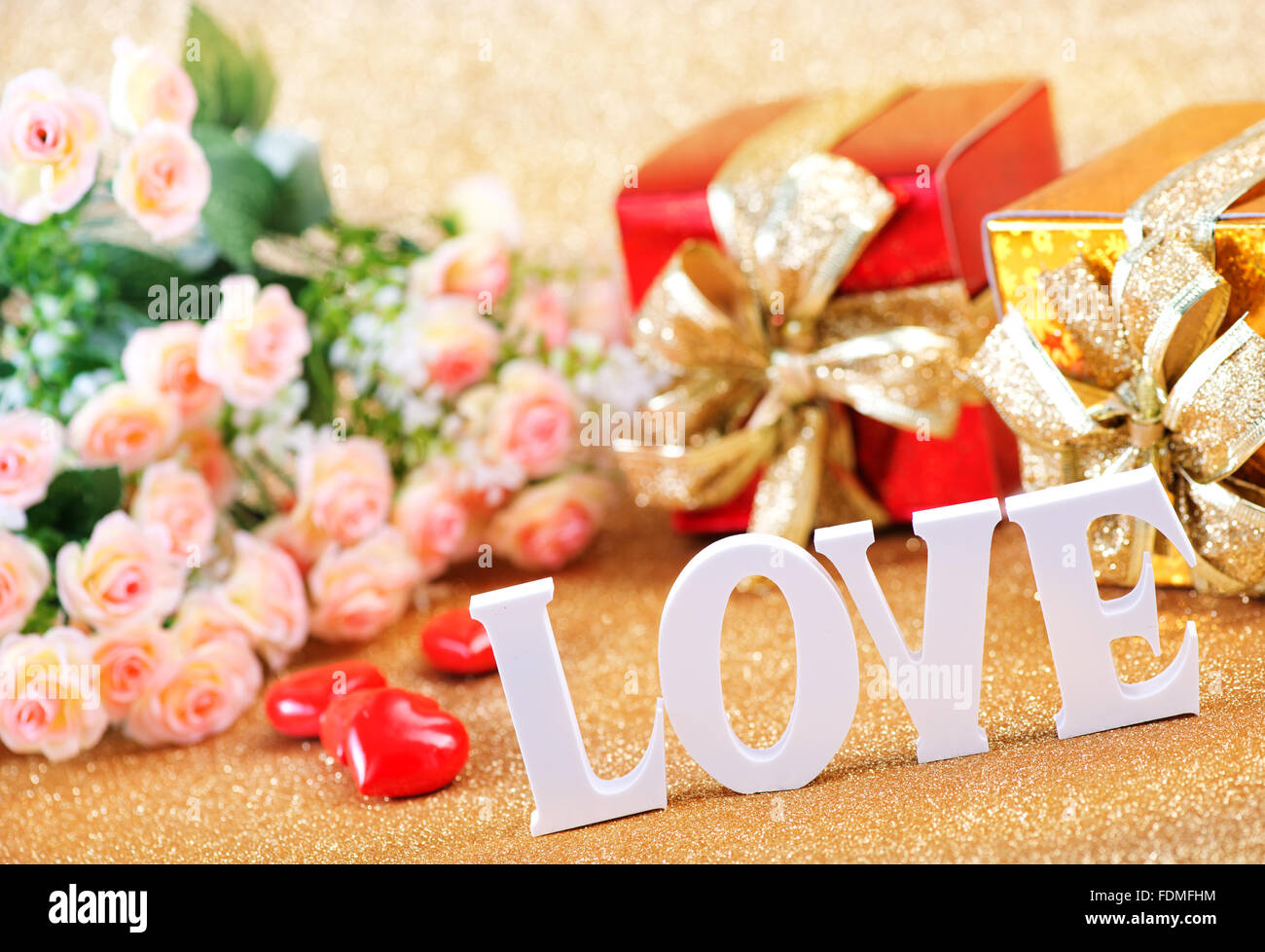 Valentine's day concept with gift box and letters "love Stock Photo - Alamy