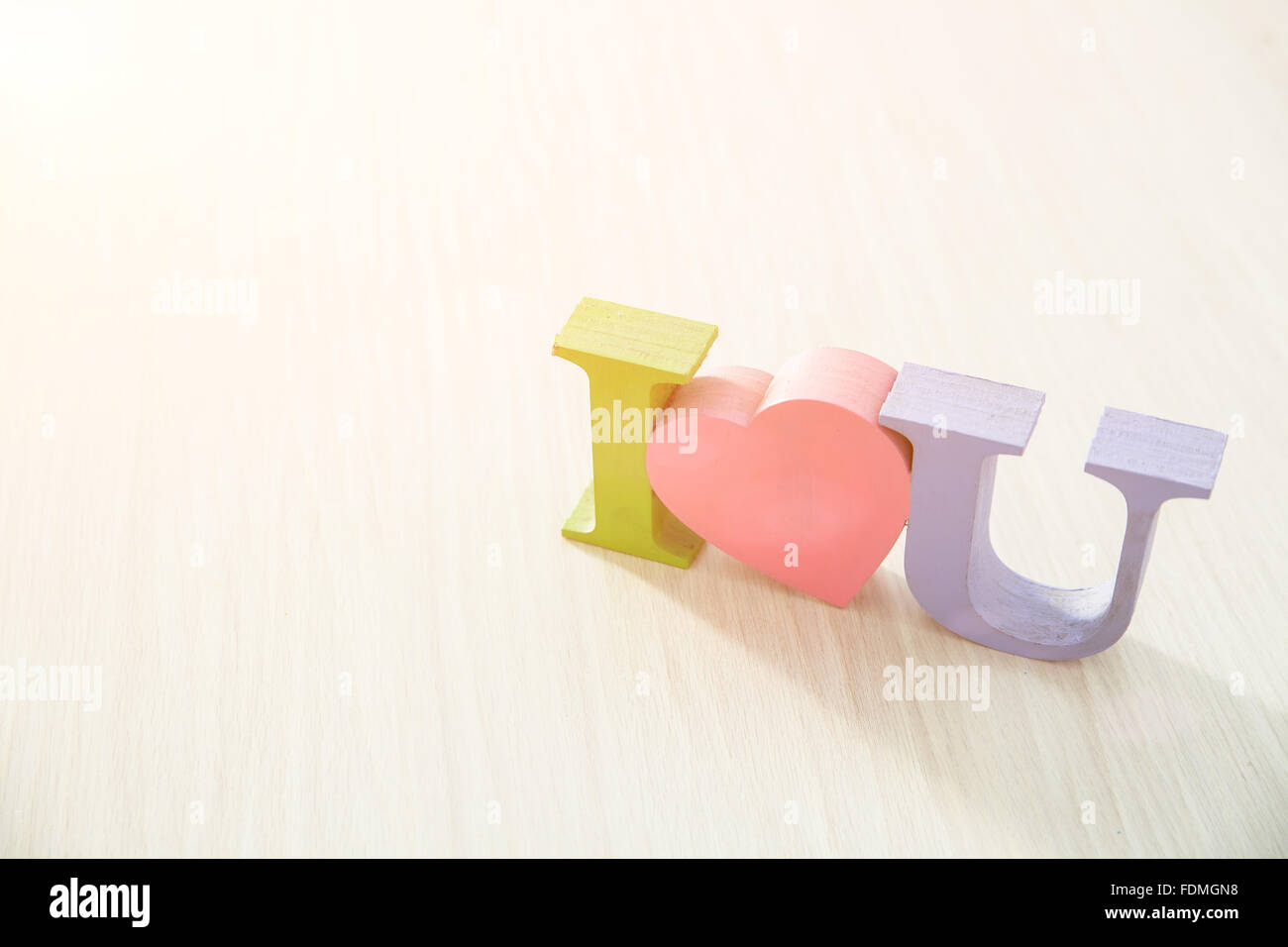 Colored letters I love you with a solar flare Stock Photo - Alamy