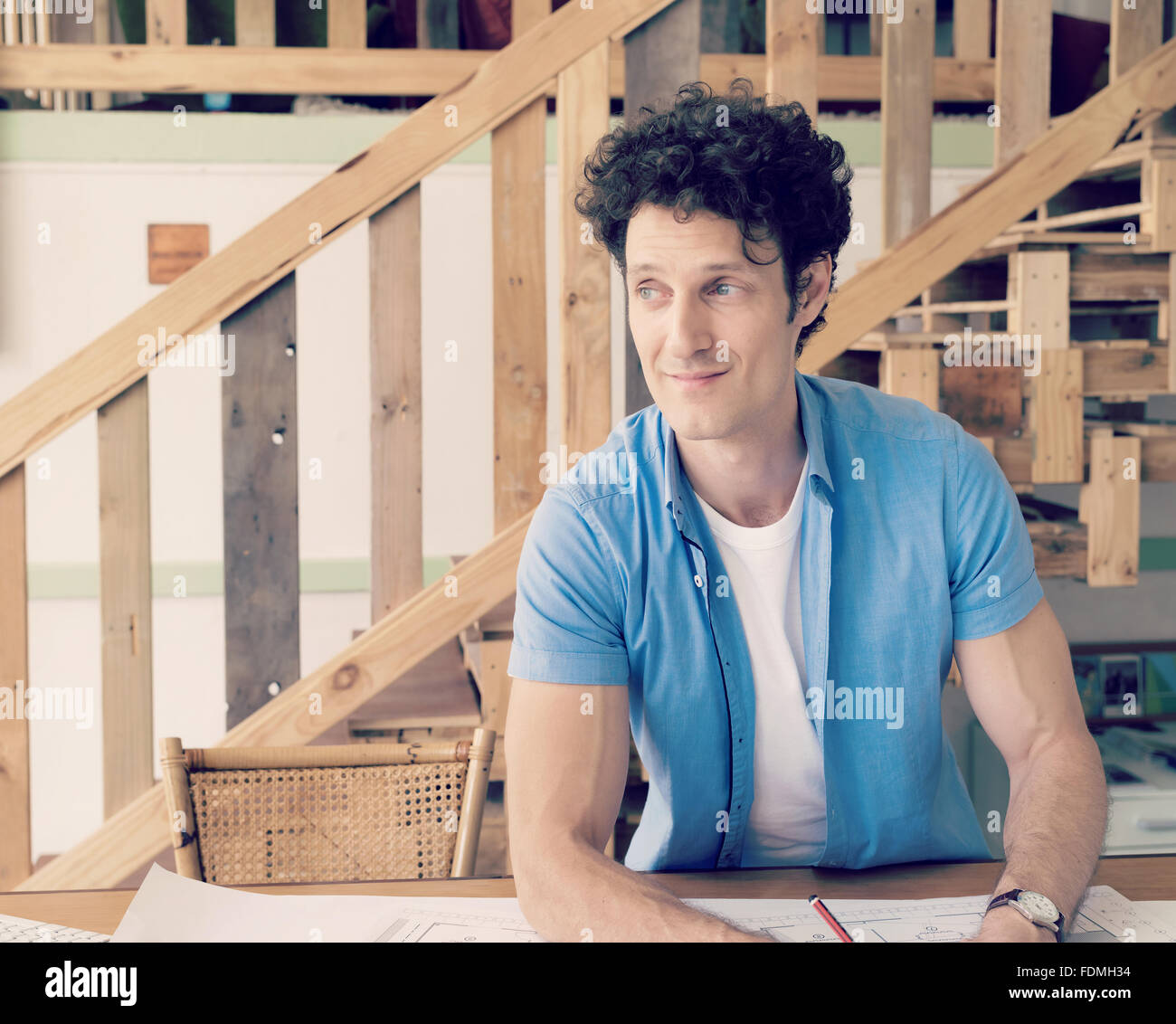 Man working with drafts in office Stock Photo - Alamy