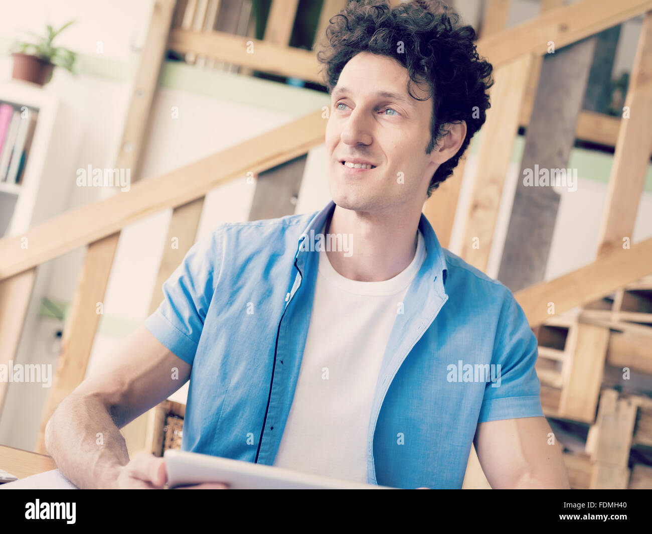 Man in casual wear working in office Stock Photo - Alamy