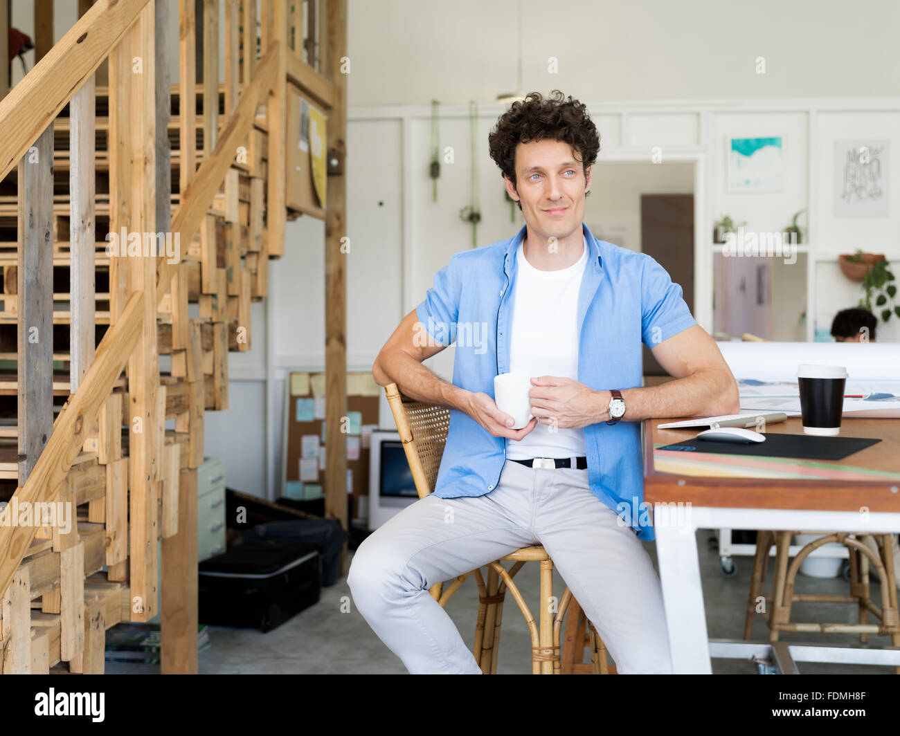 Man working with drafts in office Stock Photo - Alamy