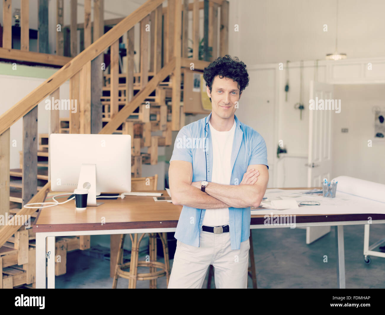 Man working with drafts in office Stock Photo - Alamy