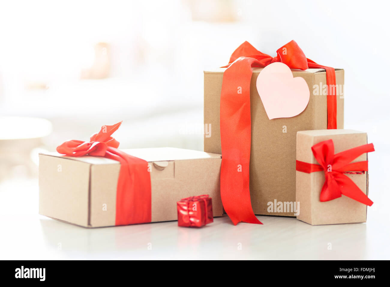 Gift box with heart Stock Photo - Alamy