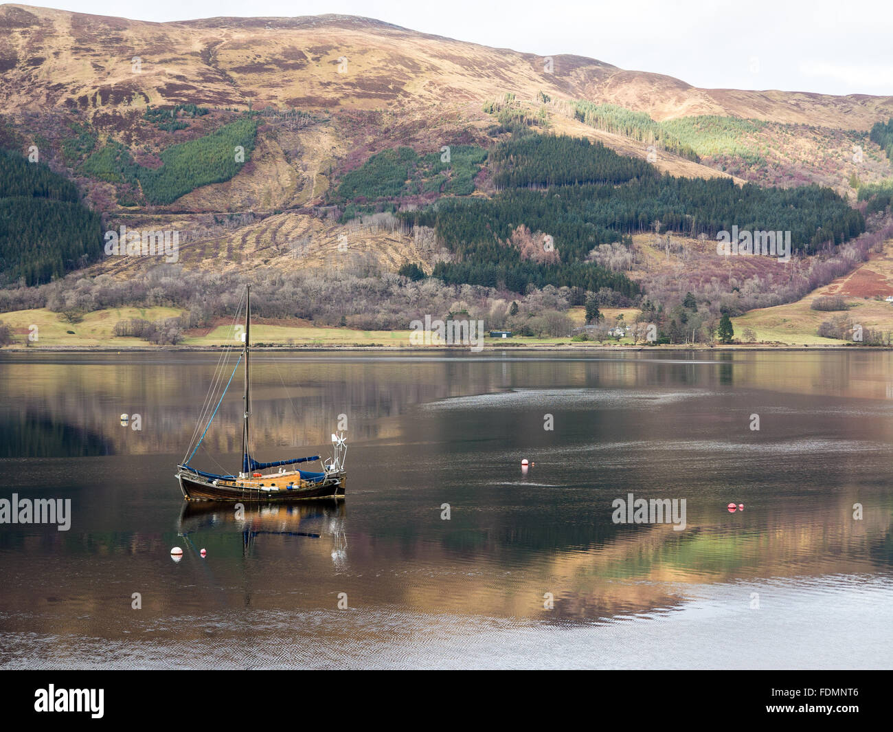 A boat on Loch Leven sea water loch near Fort William and Glencoe in ...