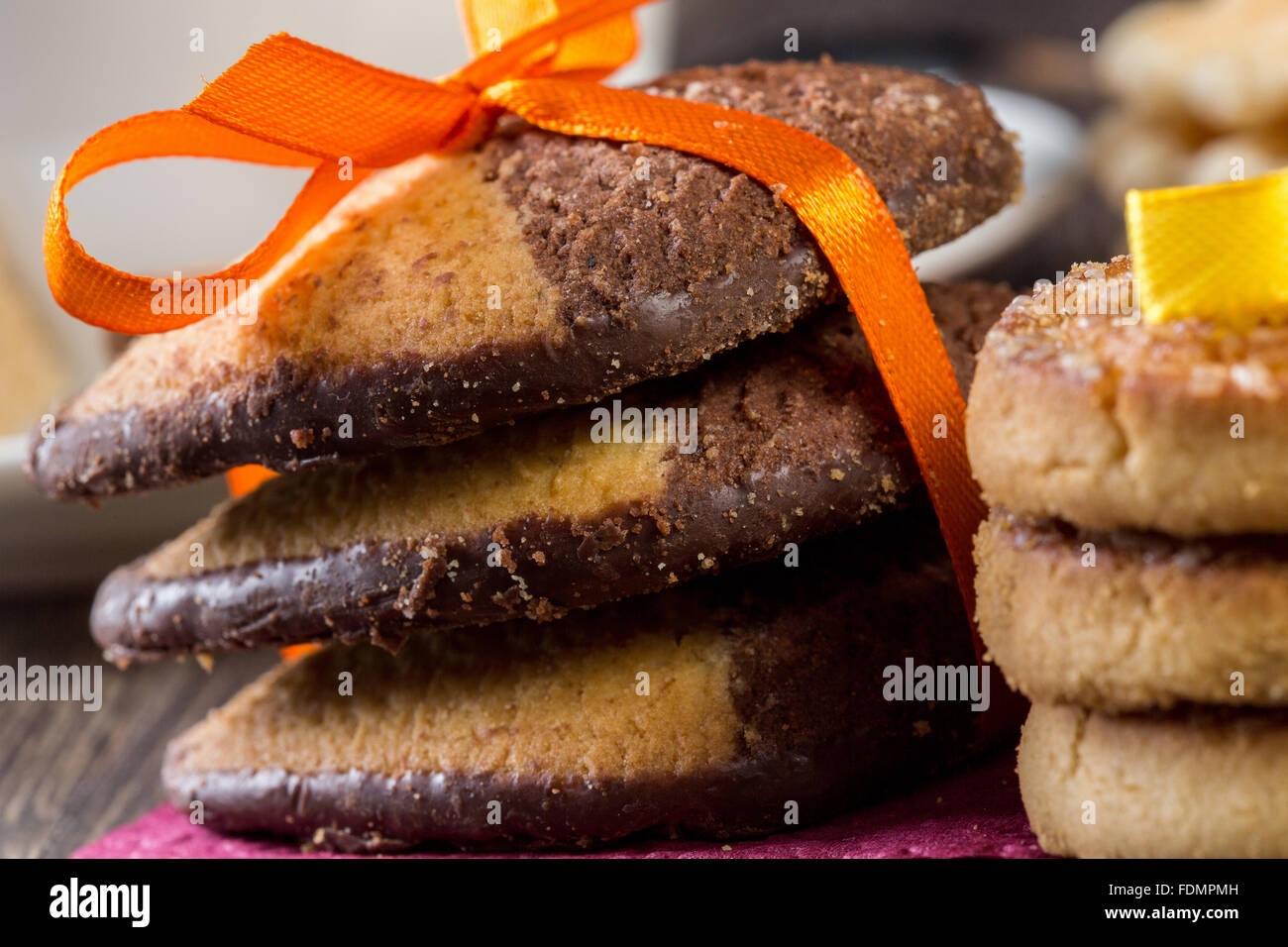 Assorted biscuits and sweets on table Stock Photo - Alamy
