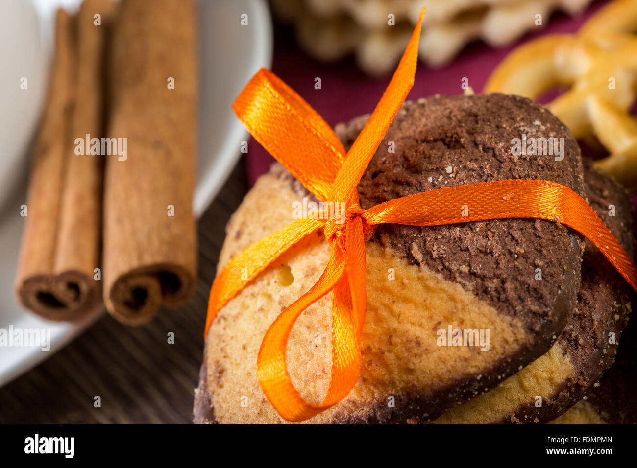 Assorted biscuits and sweets on table Stock Photo - Alamy
