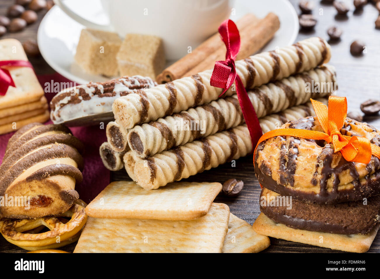 Assorted biscuits and sweets on table Stock Photo - Alamy