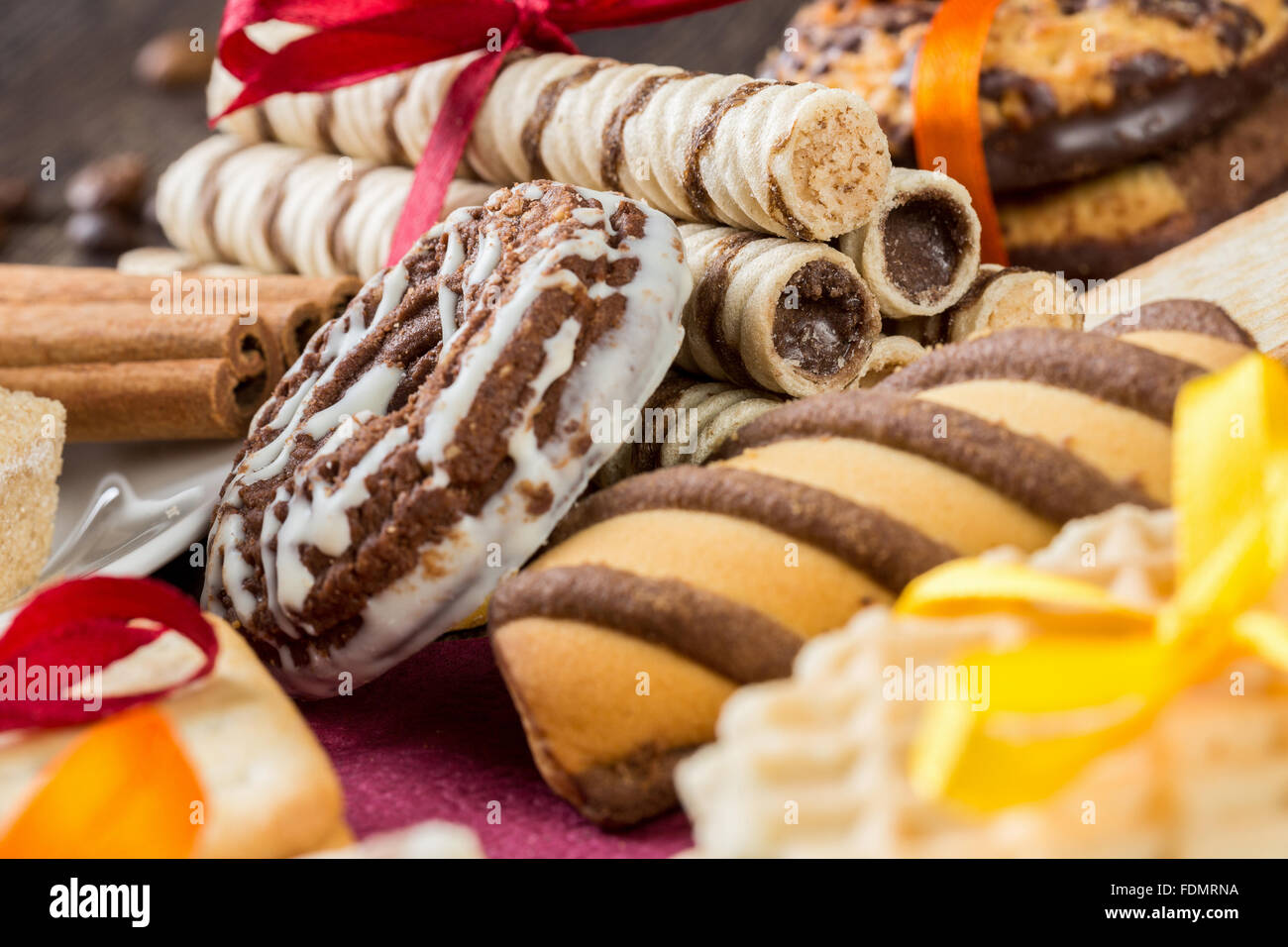 Assorted biscuits and sweets on table Stock Photo - Alamy