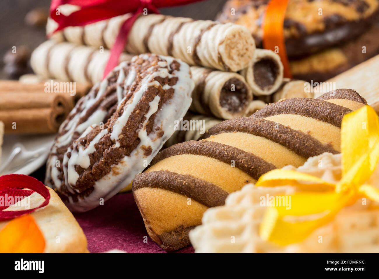 Assorted biscuits and sweets on table Stock Photo - Alamy