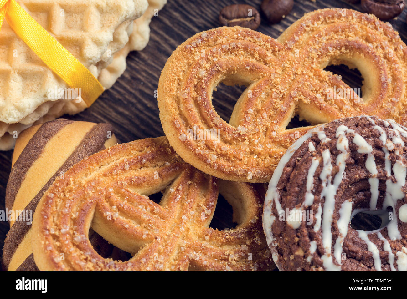 Assorted biscuits and sweets on table Stock Photo - Alamy