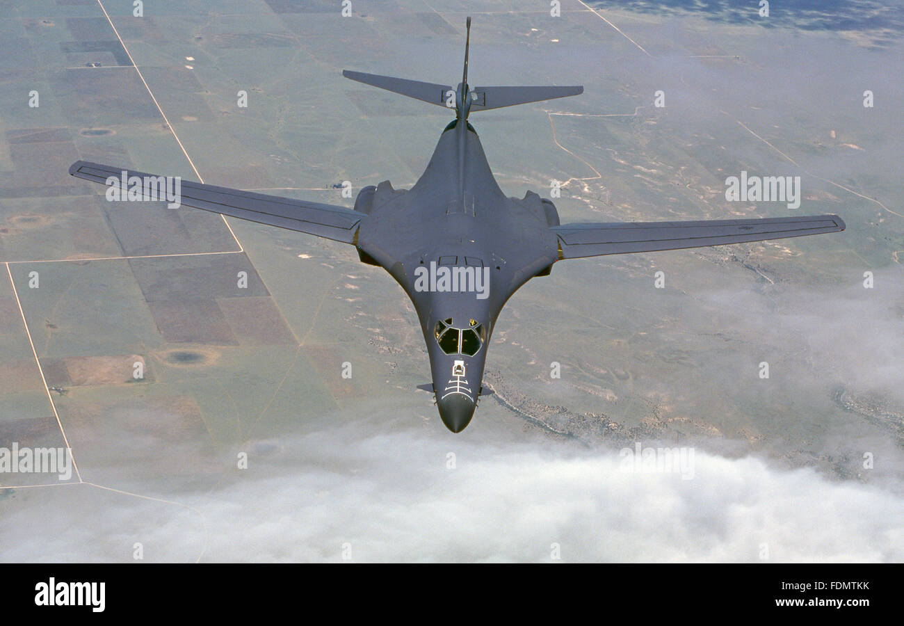 A B-1 bomber takes on fuel from an airborne KC-130 tanker over Eastern ...