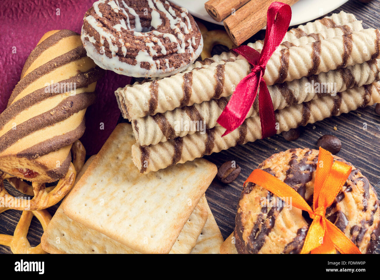 Assorted biscuits and sweets on table Stock Photo - Alamy