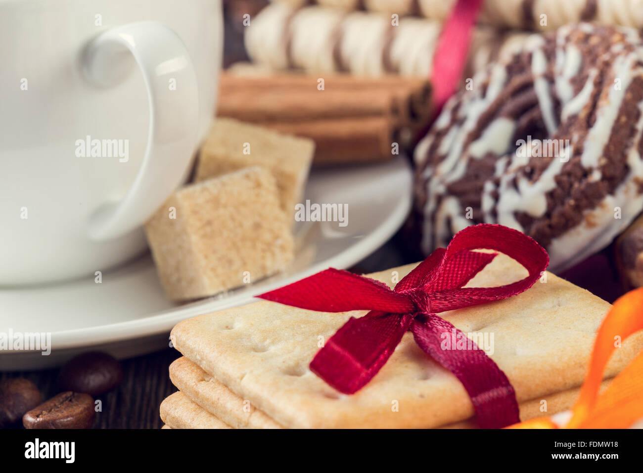 Assorted biscuits and sweets on table Stock Photo - Alamy