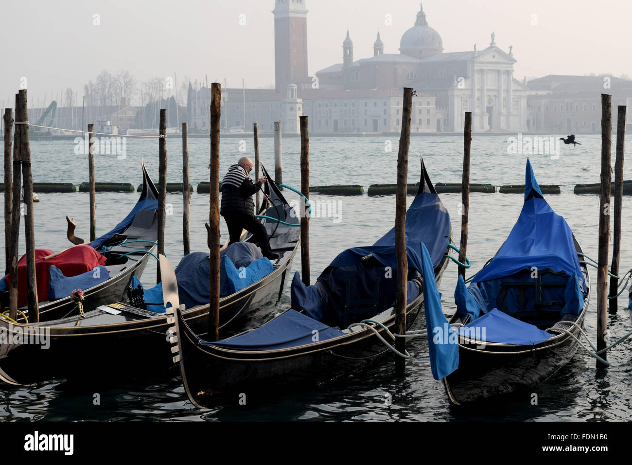 GONDOLA MOORED AT ST MARKS SQUARE VENICE ITALY EUROPE Stock Photo - Alamy