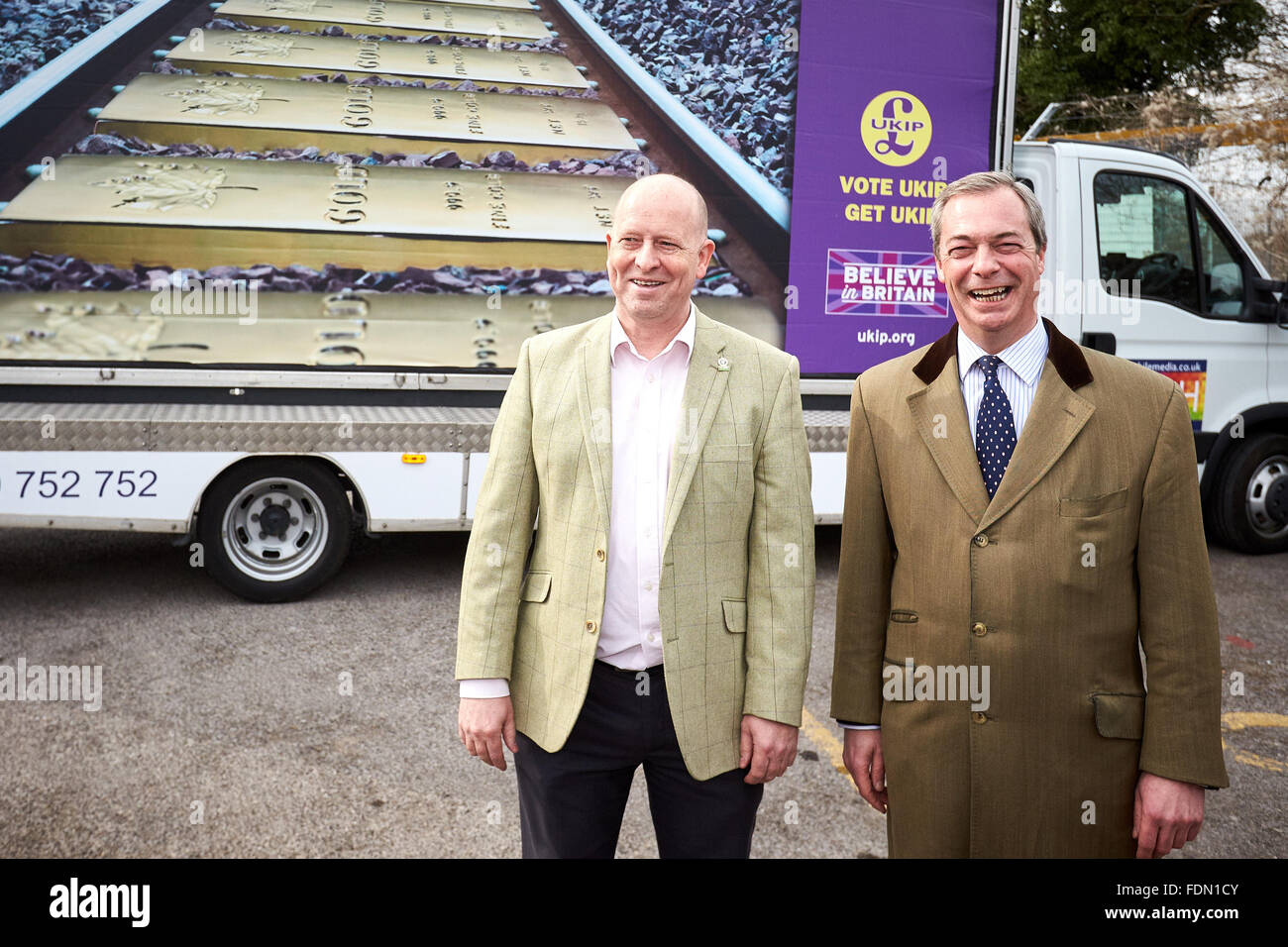 UKIP party leader Nigel Farage (R) unveils a new anti-HS2 poster at ...