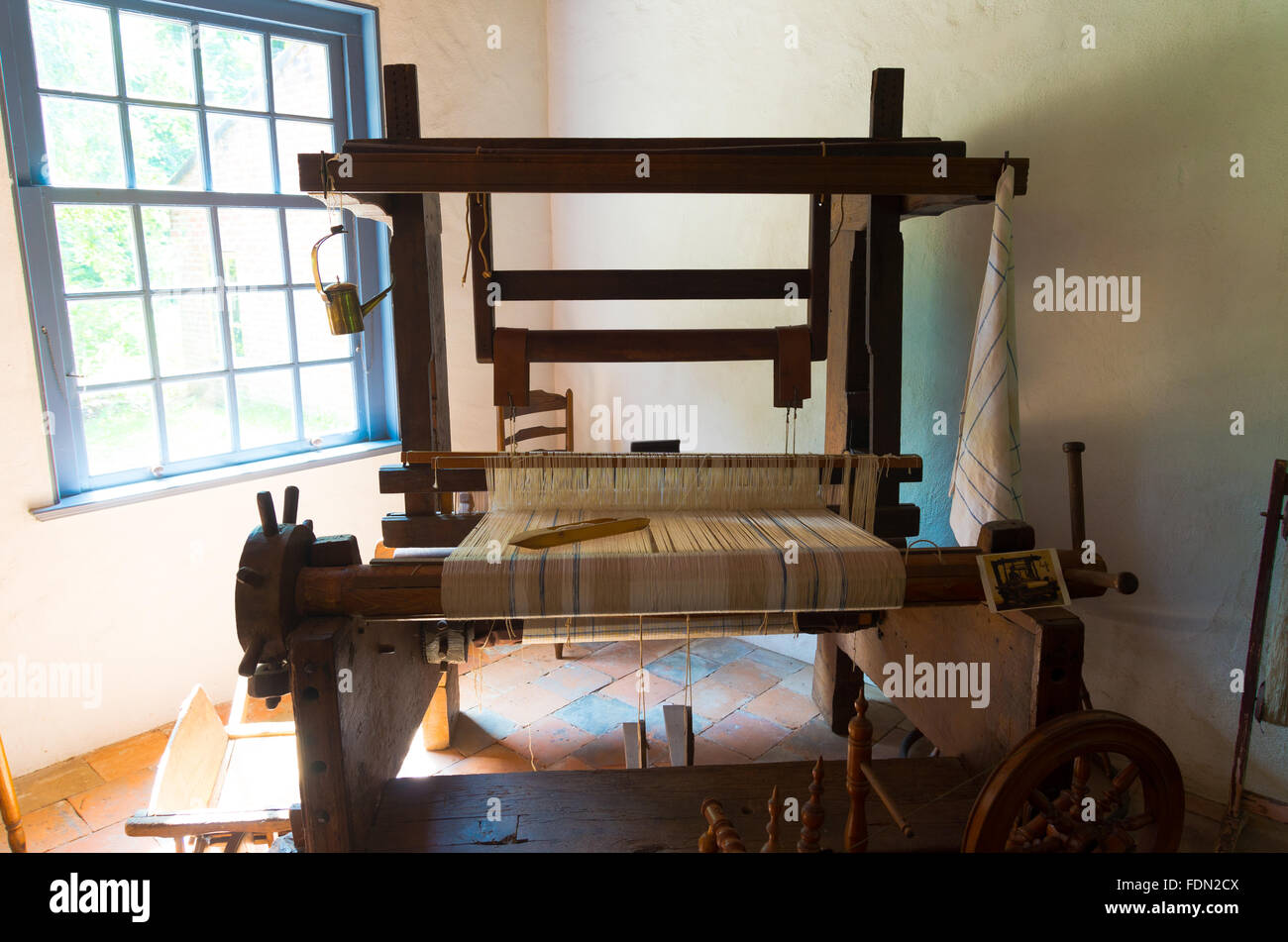 old fashioned hand loom next to a window Stock Photo - Alamy