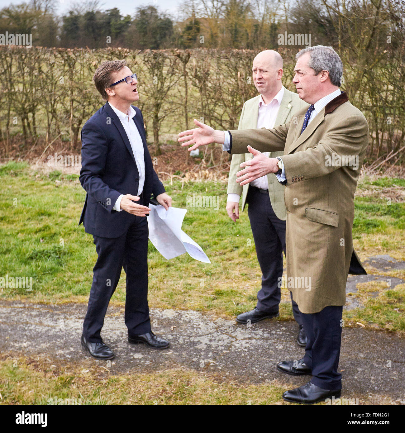 UKIP's Nigel Farage (R) pictured at the site of the Hampden Fields ...