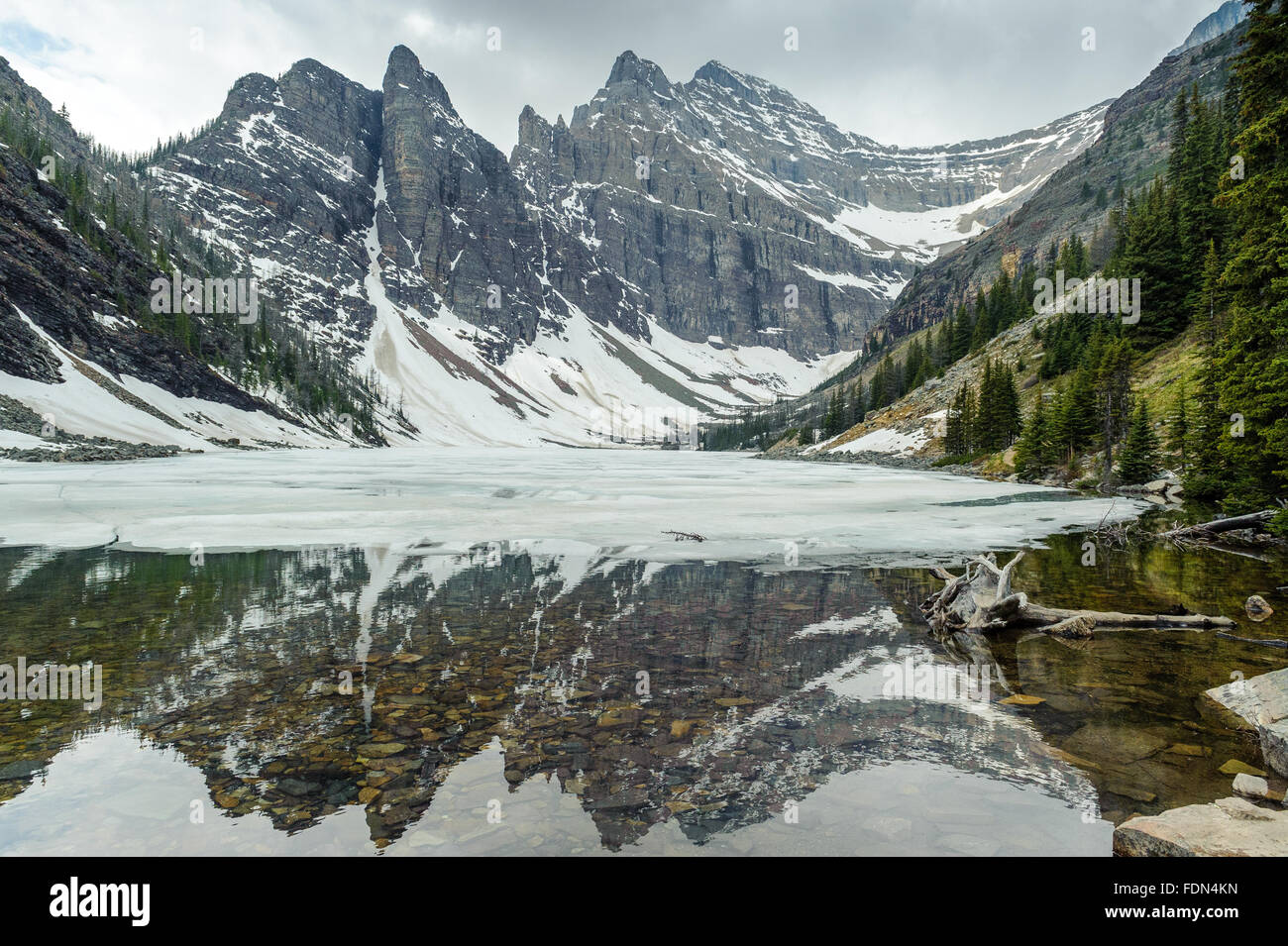 Big Beehive mountain glaciers scenic view reflecting in Agnes Lake in ...