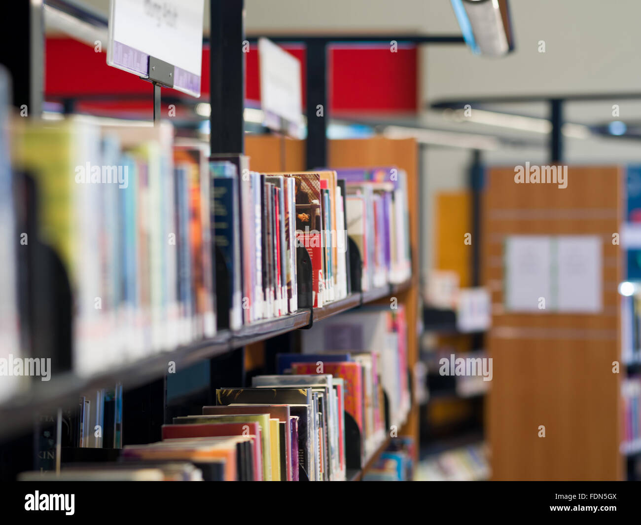 Interior of library with book shelves with books Stock Photo - Alamy