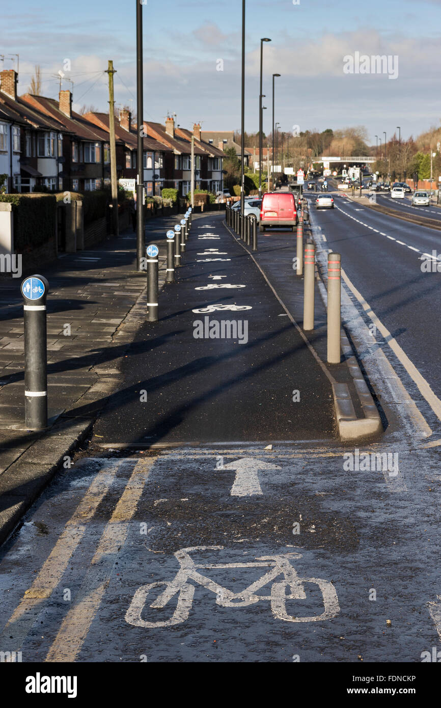 Cycle lane between road and pavement at Gosforth, Newcastle upon Tyne ...