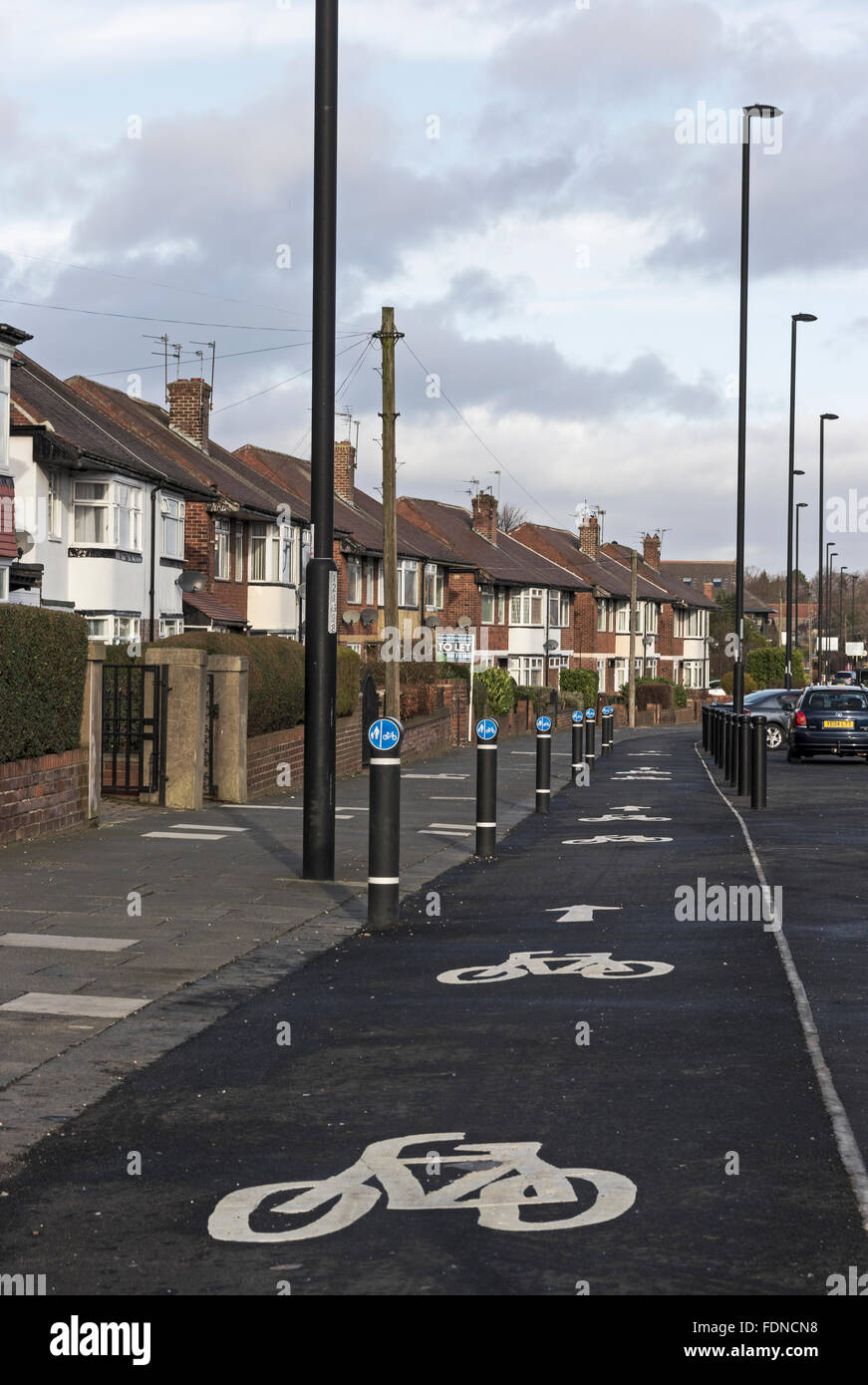 Cycle lane between road and pavement at Gosforth, Newcastle upon Tyne ...